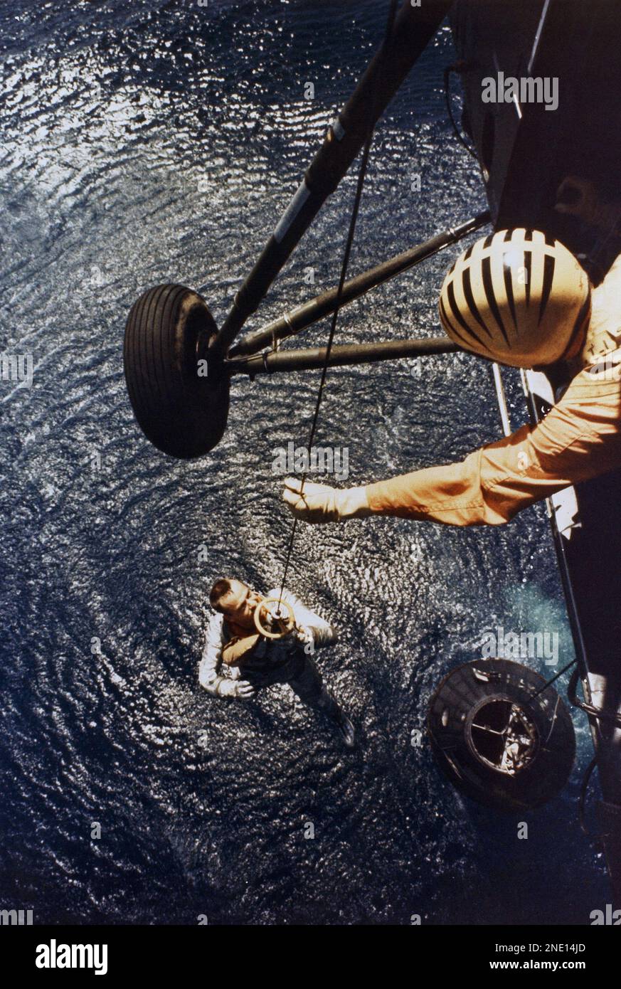 Astronaut Alan M. Shepard is rescued by a U.S. Marine helicopter at the ...