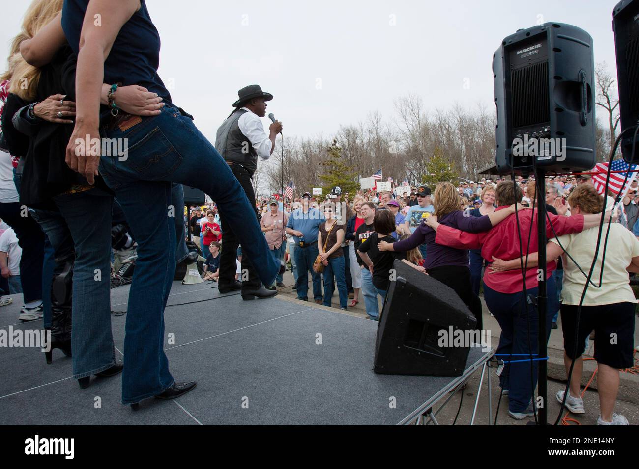 In this April 1, 2010 photo, participants dance at a tea party express ...