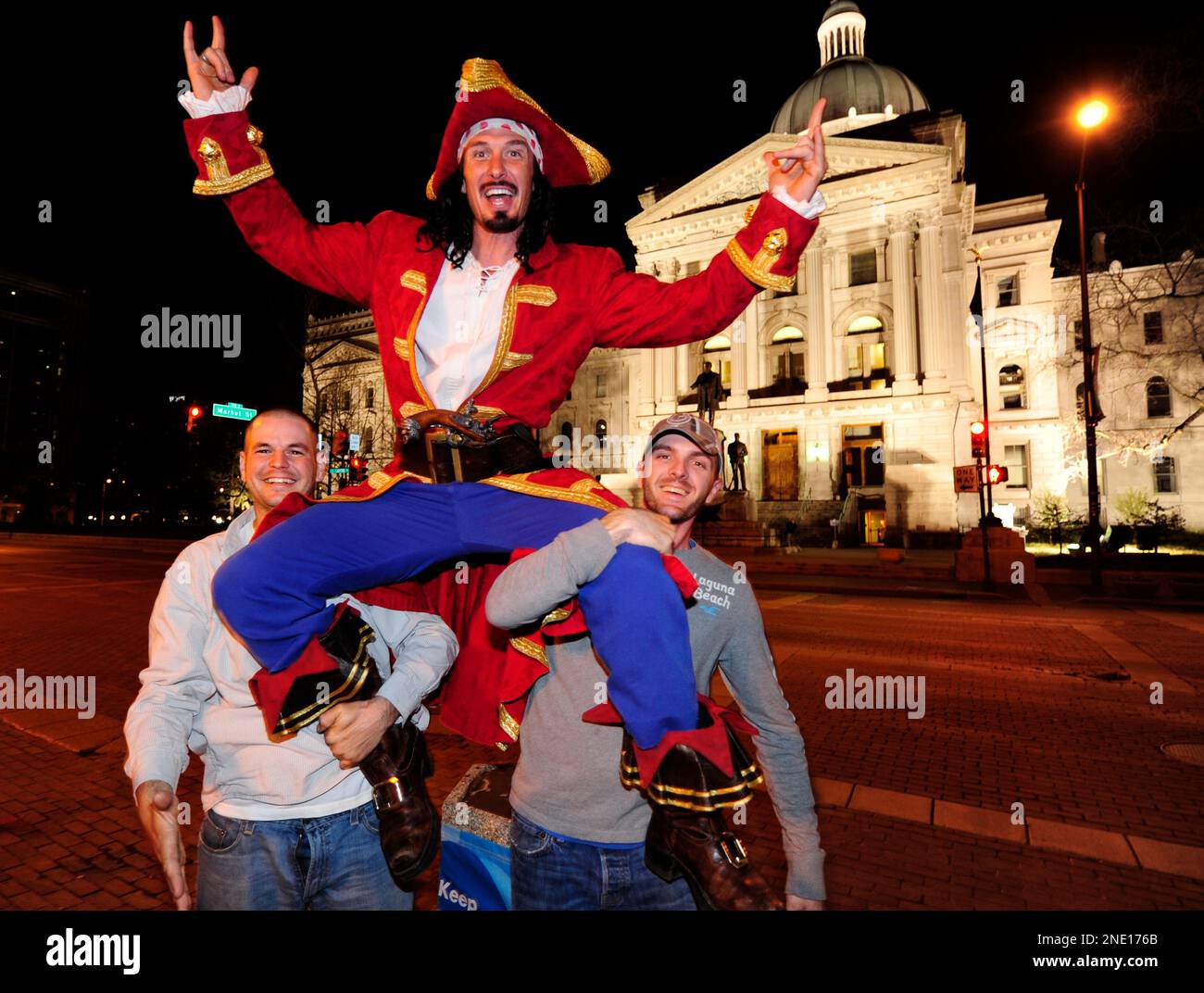 Captain Morgan celebrates with basketball fans during the Captain ...