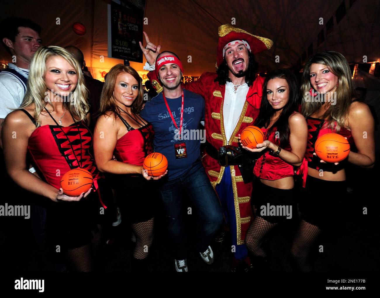 Captain Morgan and the Morganettes celebrate with basketball fans ...