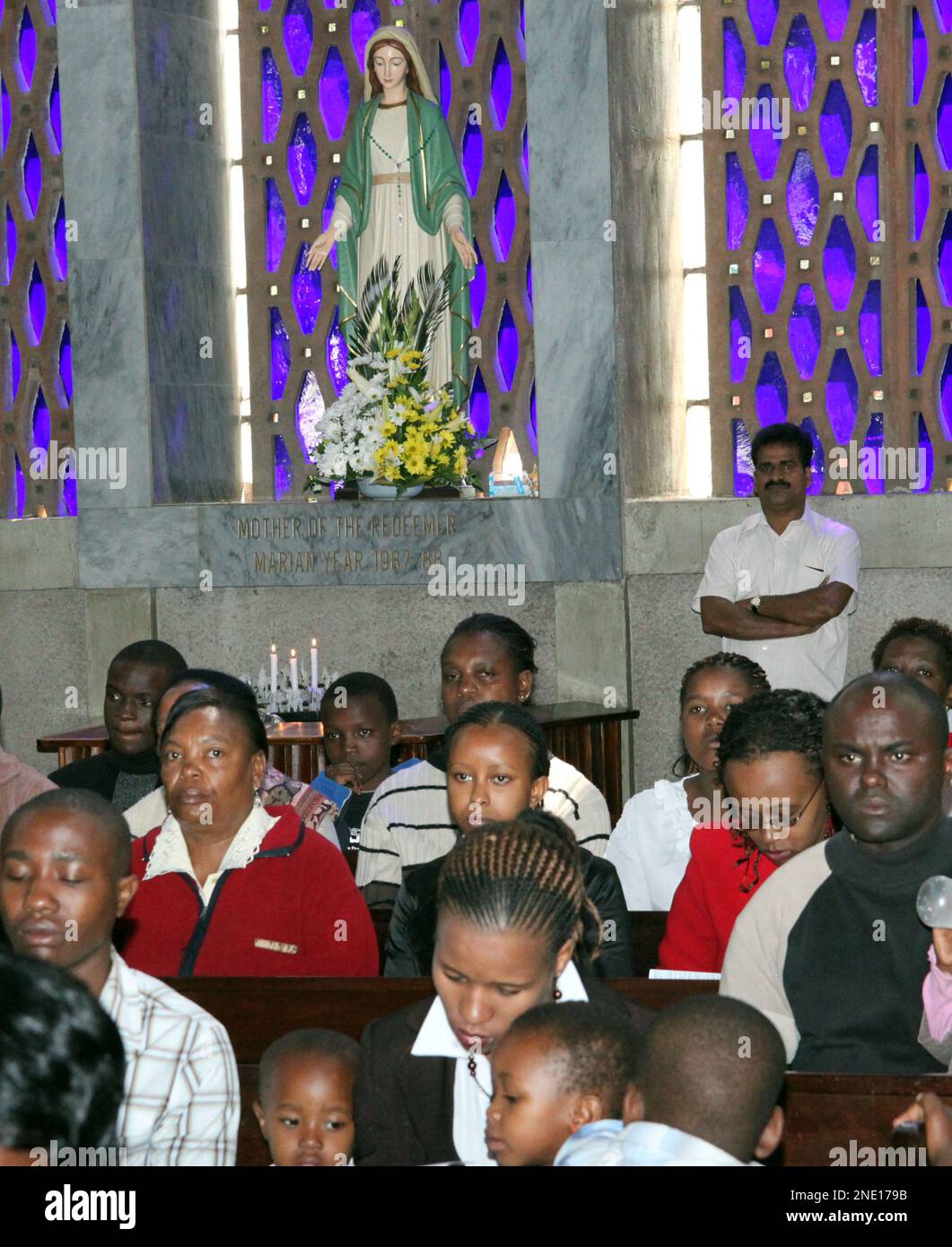 Kenyan Christian as they join morning service at Holy Family Basilica ...