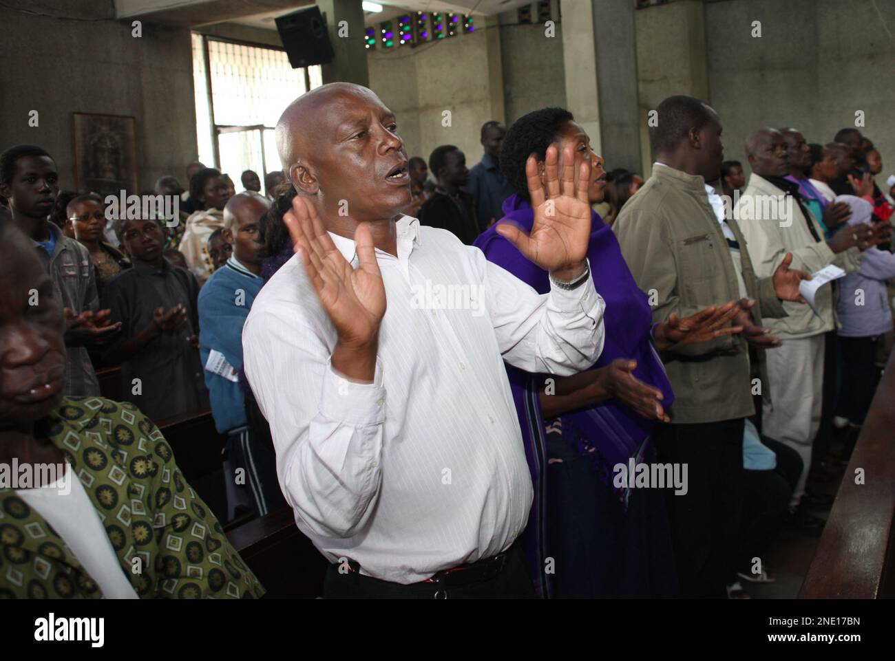Kenyan Christian pray as they joins at Holy Family Basilica , Nairobi ...