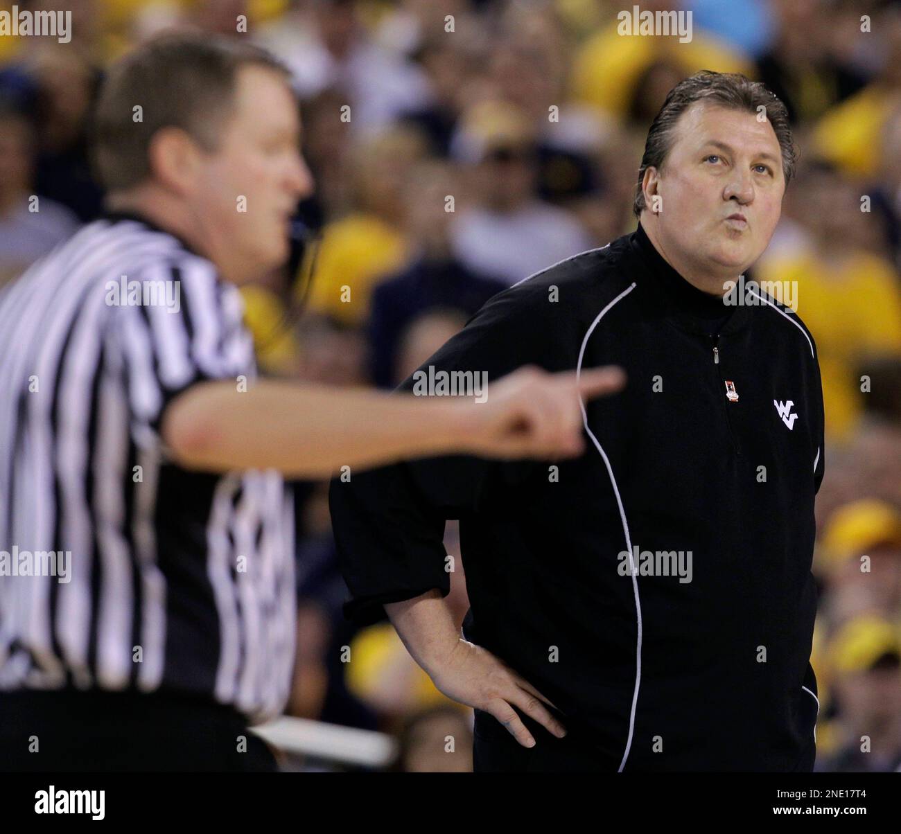 West Virginia head coach Bob Huggins reacts to a call during the first ...
