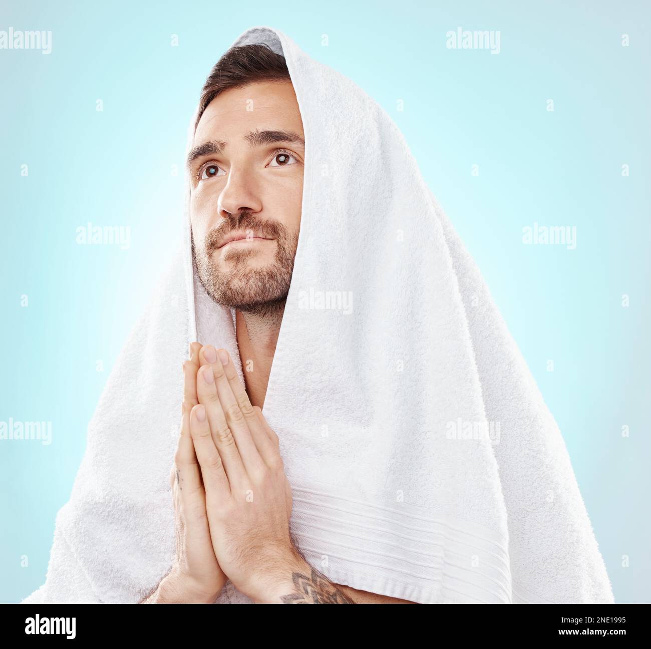 Prayer, thinking and worship with man and towel for hope, spiritual and ...