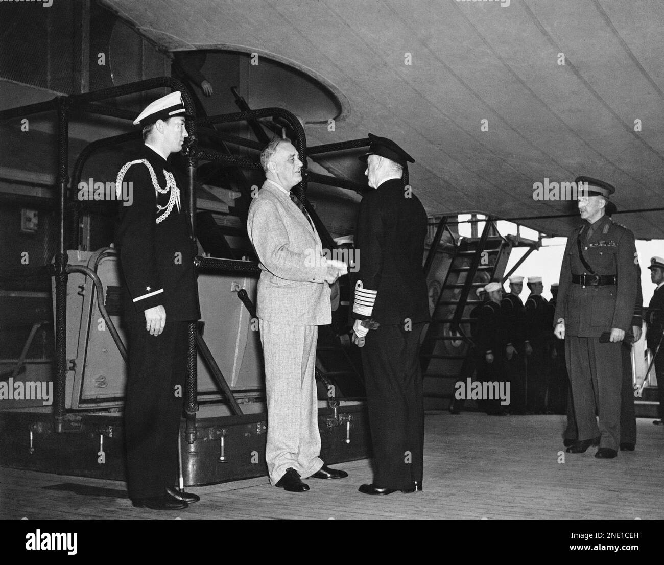 U.S. President Franklin D. Roosevelt clasps the hand of Admiral Sir ...