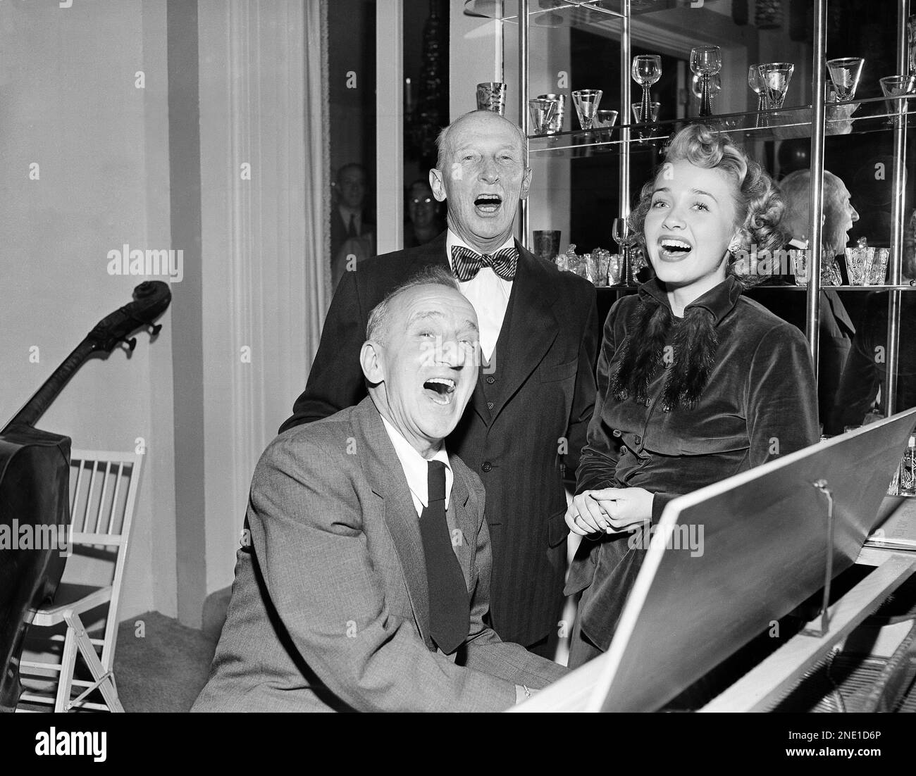 In comfortably heated houses or outdoors in cold winds, the old carols ...