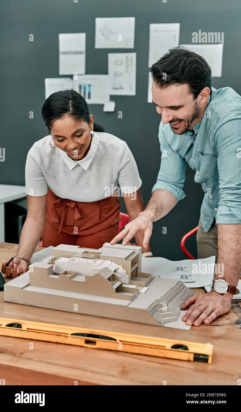 Reaching the completion of another project. two architects working ...