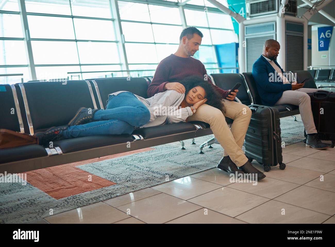 Young couple sleeping on bench hi-res stock photography and images - Alamy