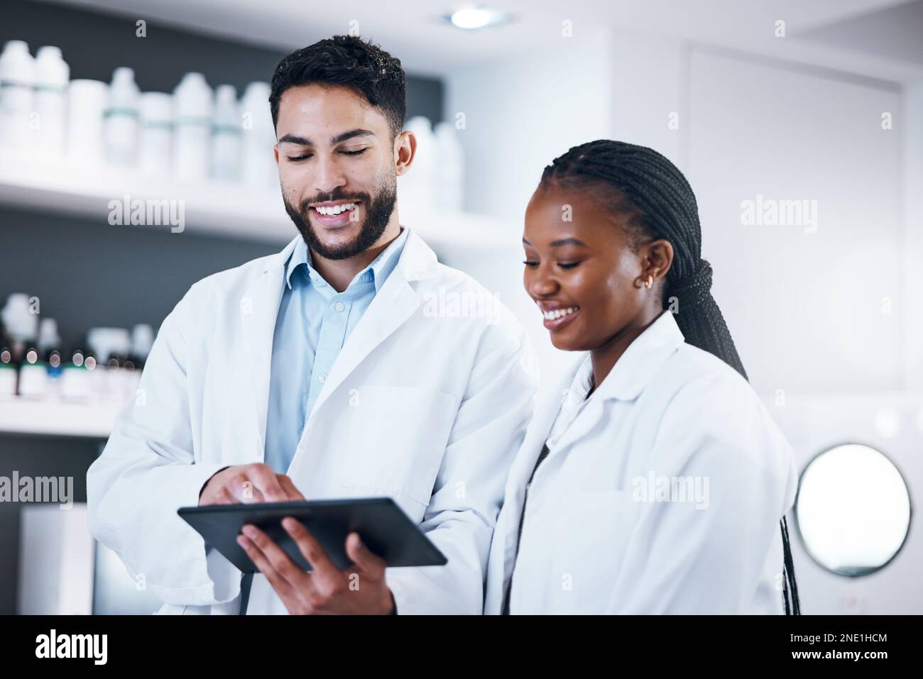 Science research, tablet and scientist people with pharmaceutical ...