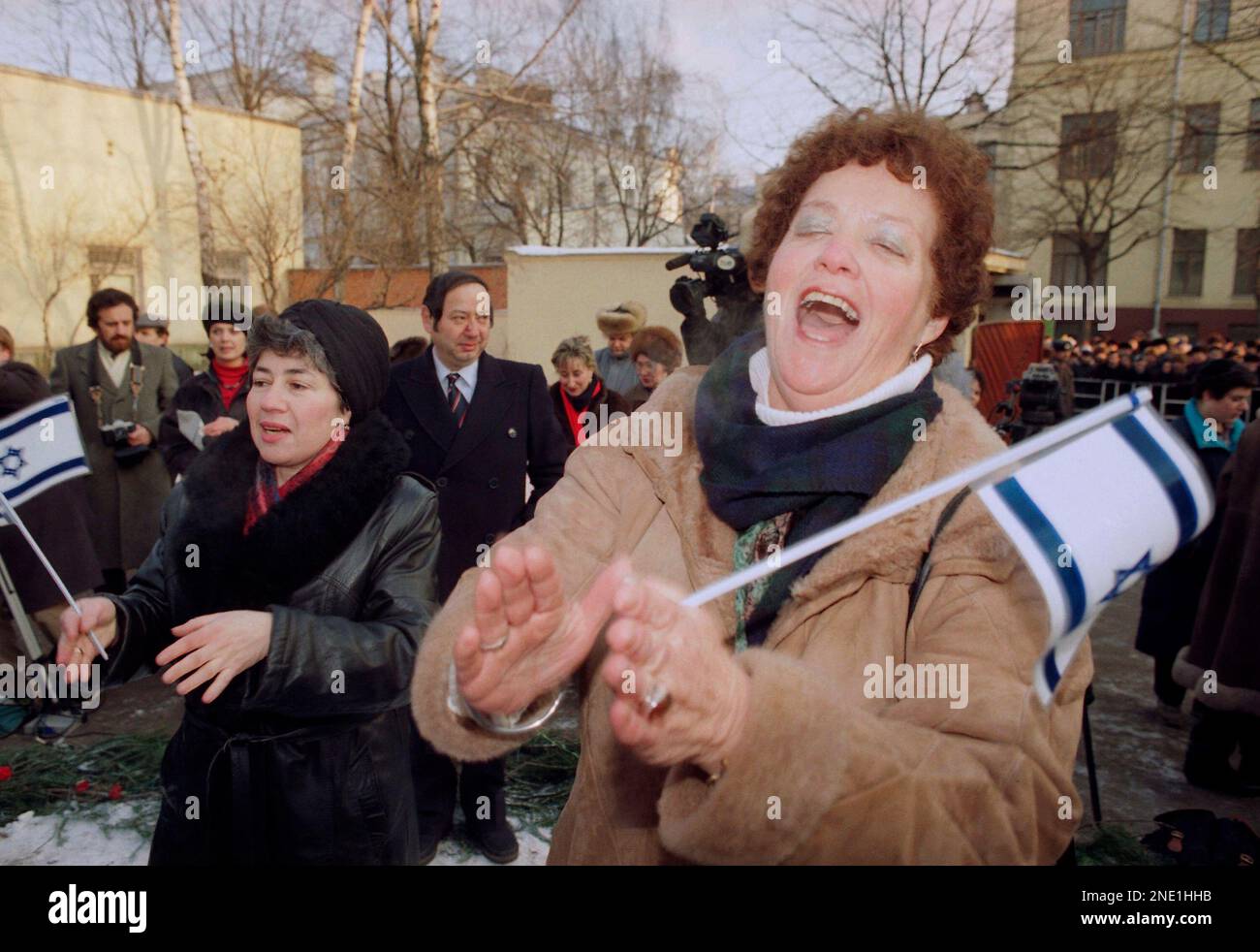 Soviet Jews with blue and white Israeli flags cheerfully doing ...