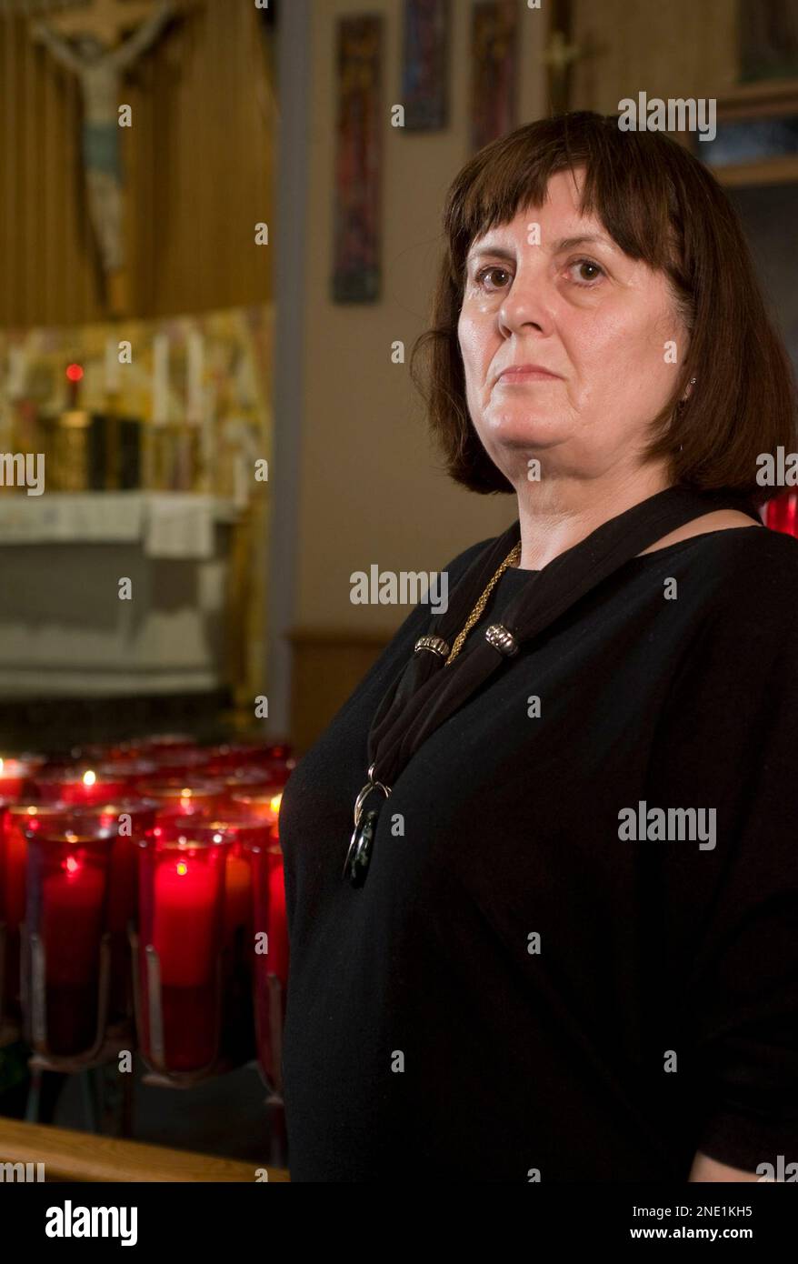 Donna Zovko, of Cleveland, is shown after a memorial service for her ...