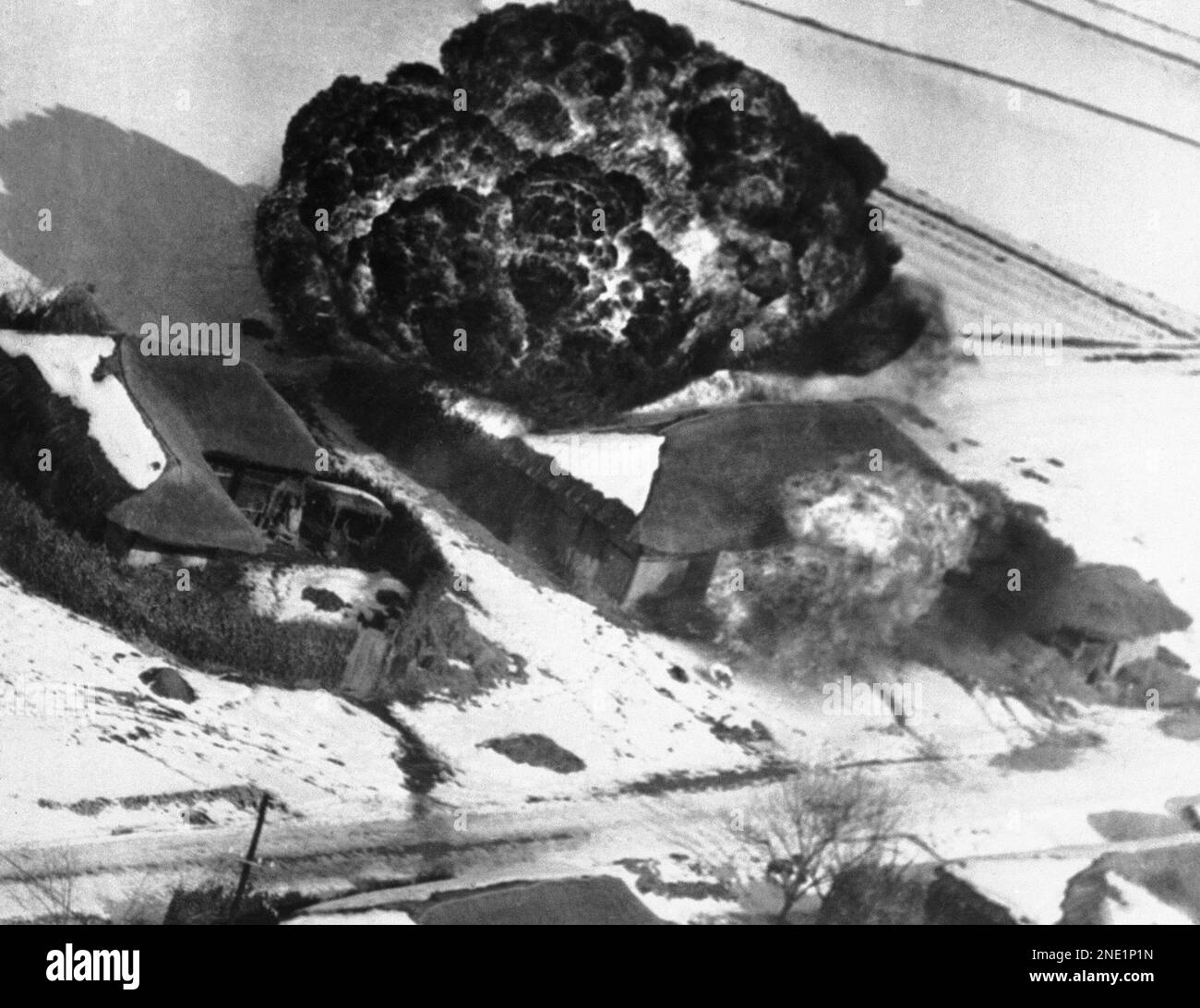 A napalm bomb scores a direct hit on an enemy barracks in Northern ...