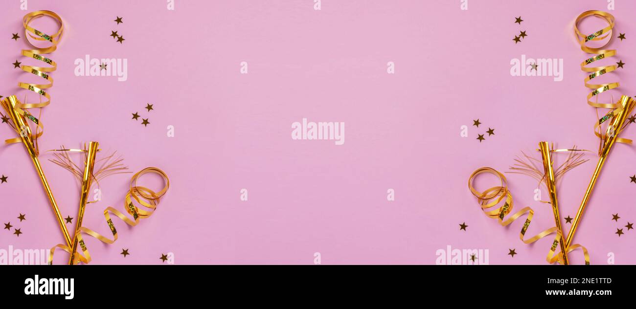 Festive background with golden serpentine, confetti and sparkles ...