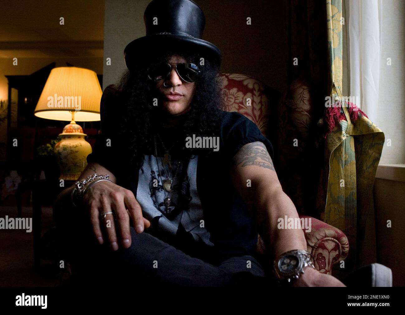In this March 12, 2010 photo, guitarist Slash poses for a photo in ...
