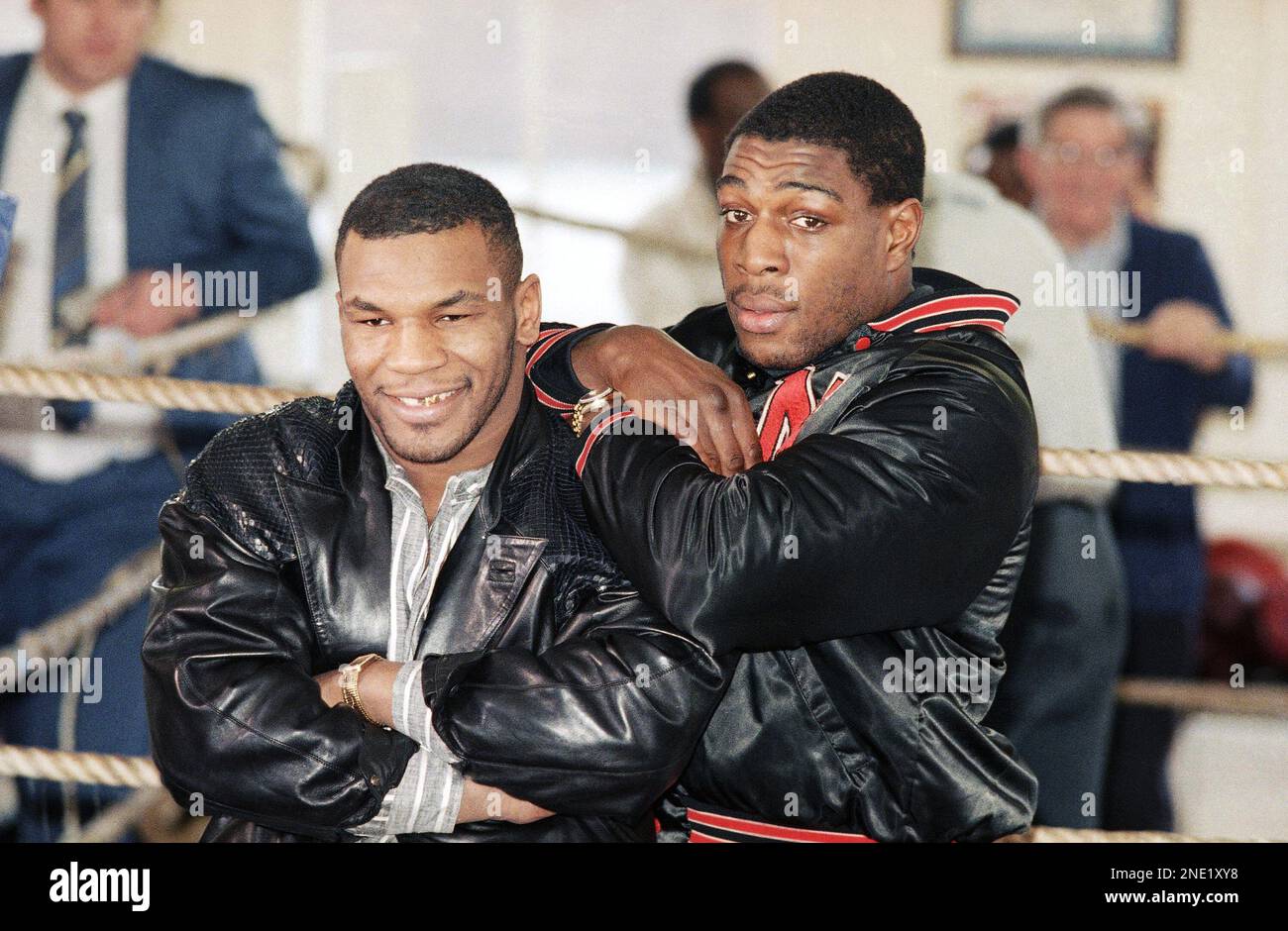 World heavyweight boxing champion Mike Tyson takes the weight of ...