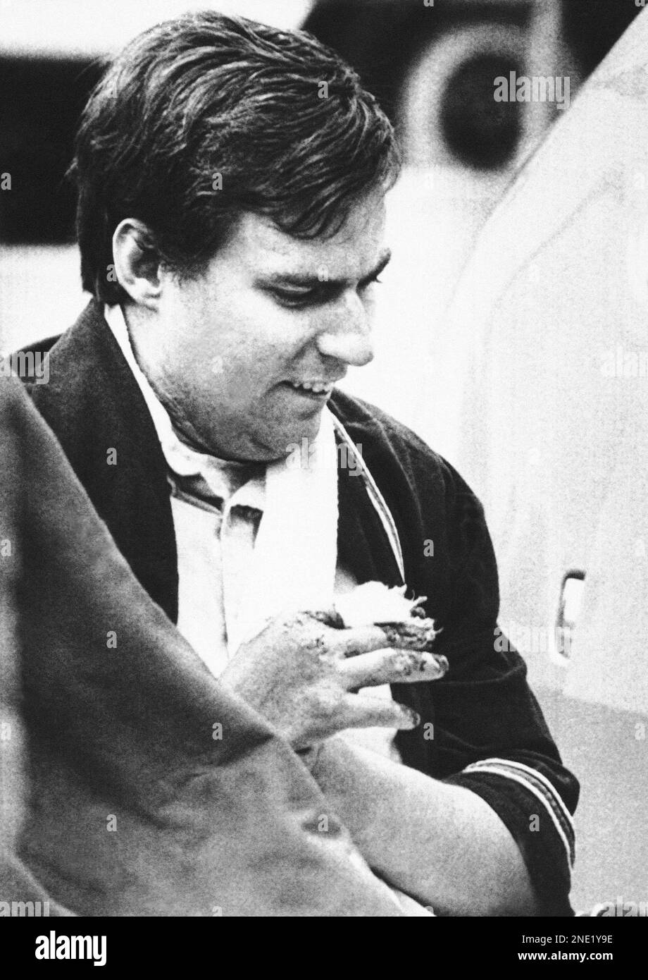 Mark Hofmann, wheelchair-bound and bandaged from injuries sustained ...