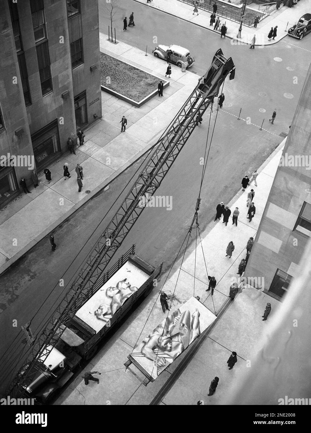 The Isamu Noguchi sculpture "News" is prepared for placement above the ...