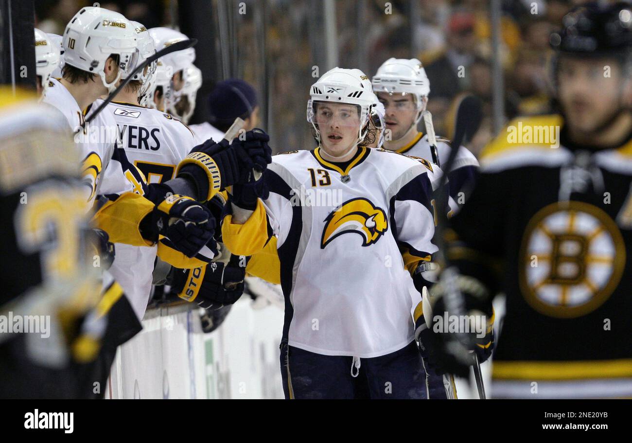 Buffalo Sabres left wing Tim Kennedy, center, is congratulated by ...