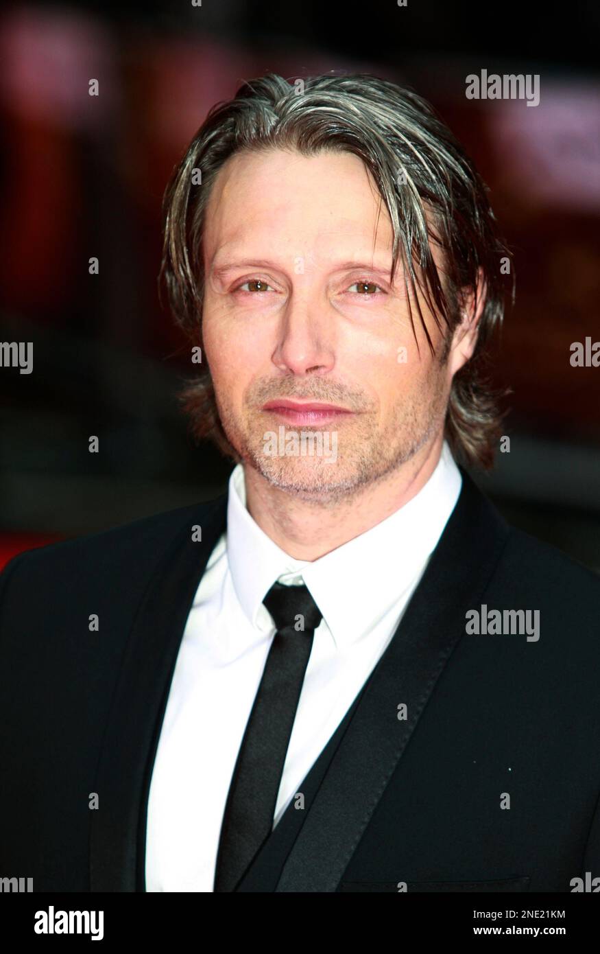 Actor Mads Mikkelsen poses for the photographers as he arrives for the ...
