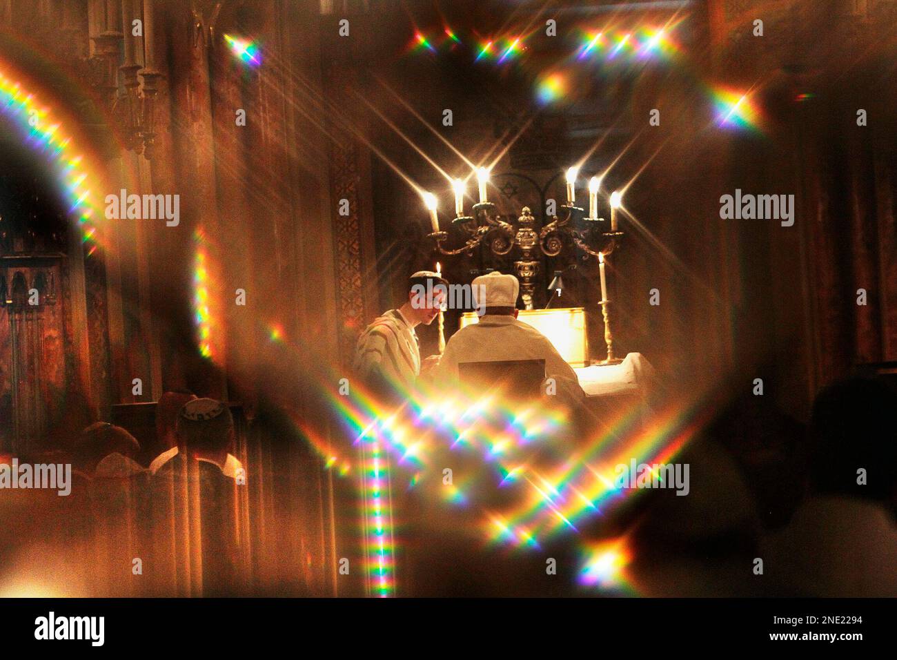 Seen through the glass door of the Great Synagogue, Jewish cantor Iosif ...