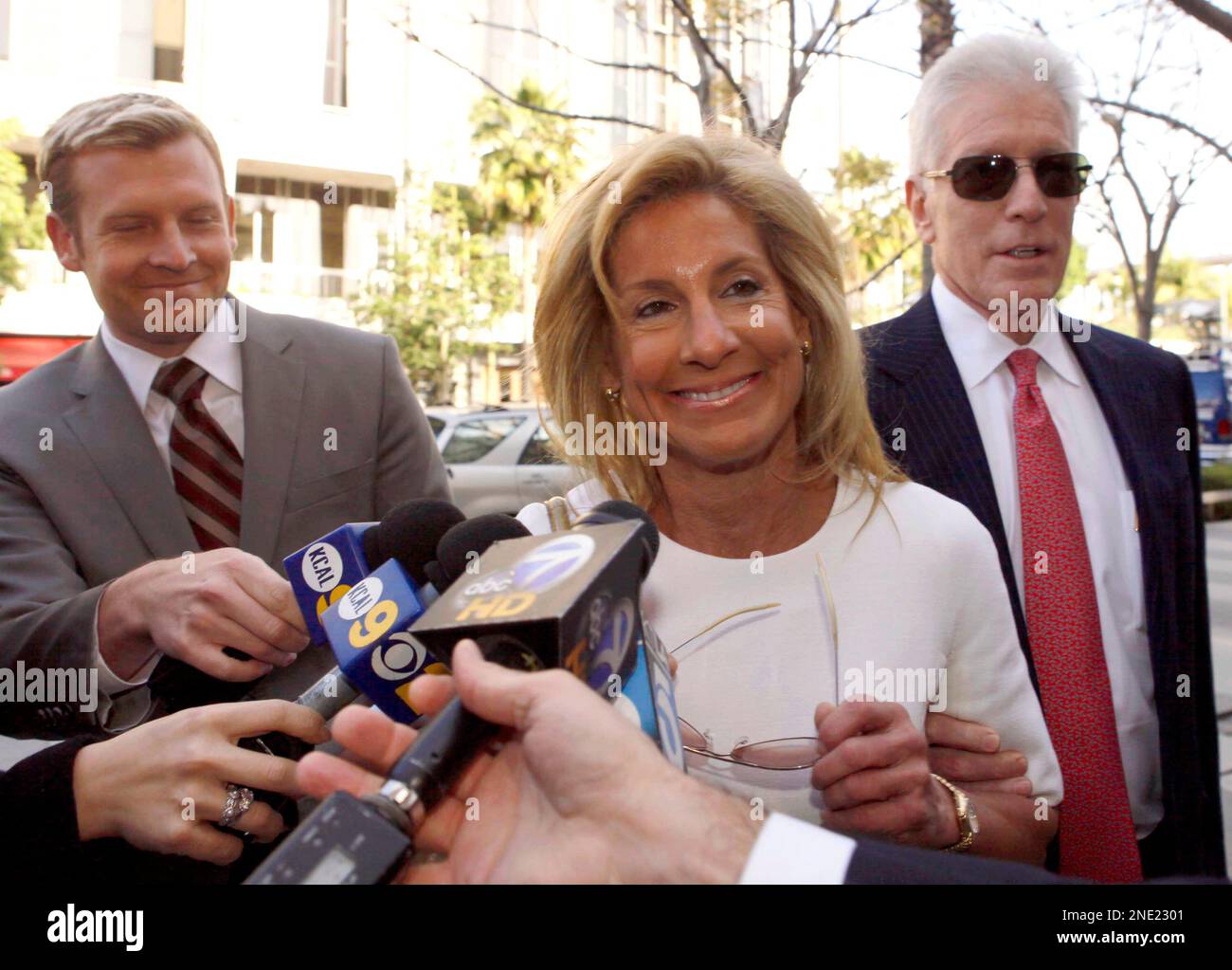 Los Angeles Dodgers ex-CEO Jamie McCourt arrives with her attorney ...