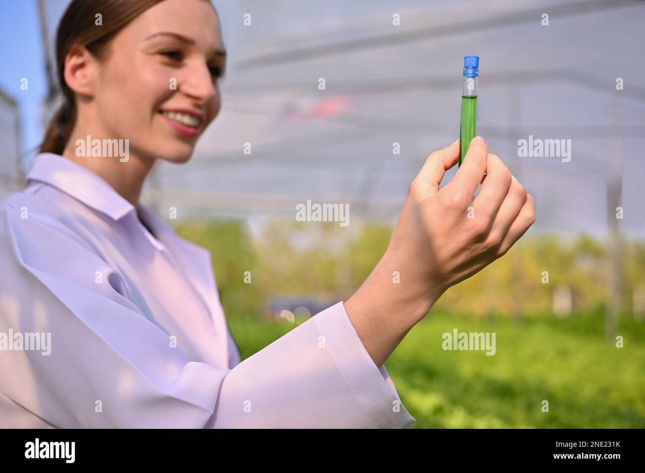 Smart and professional Caucasian female agricultural scientist or ...