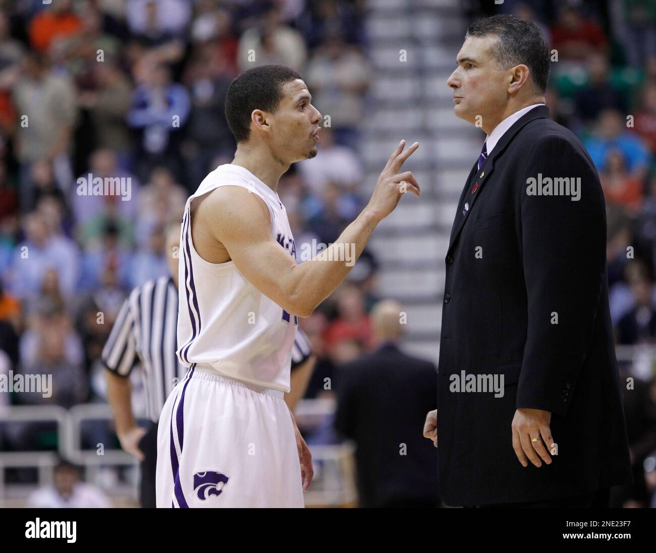 Kansas State's Denis Clemente, left, talks with Kansas State head coach ...