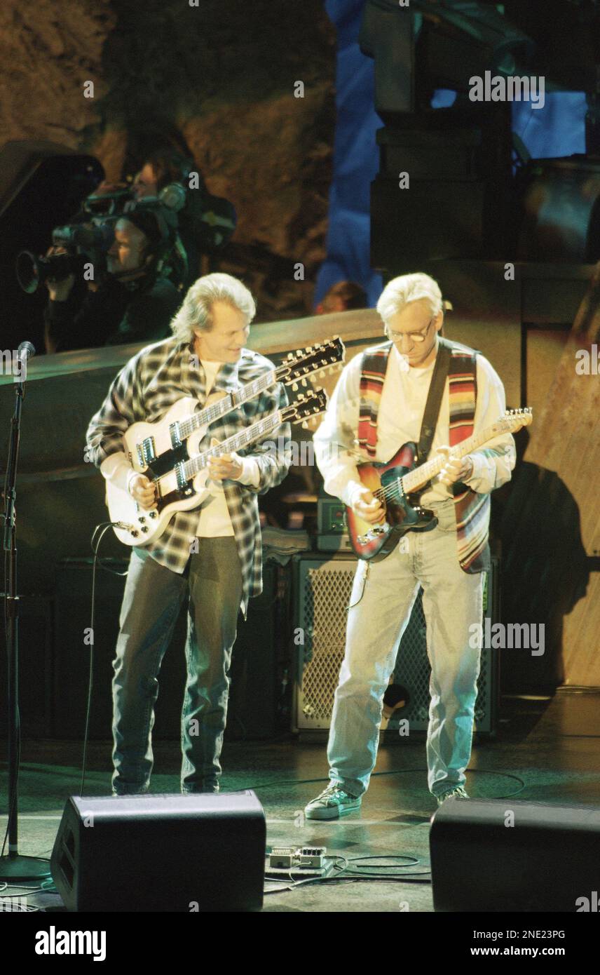 Don Felder, left, and Joe Walsh, of the rock group Eagles, perform ...