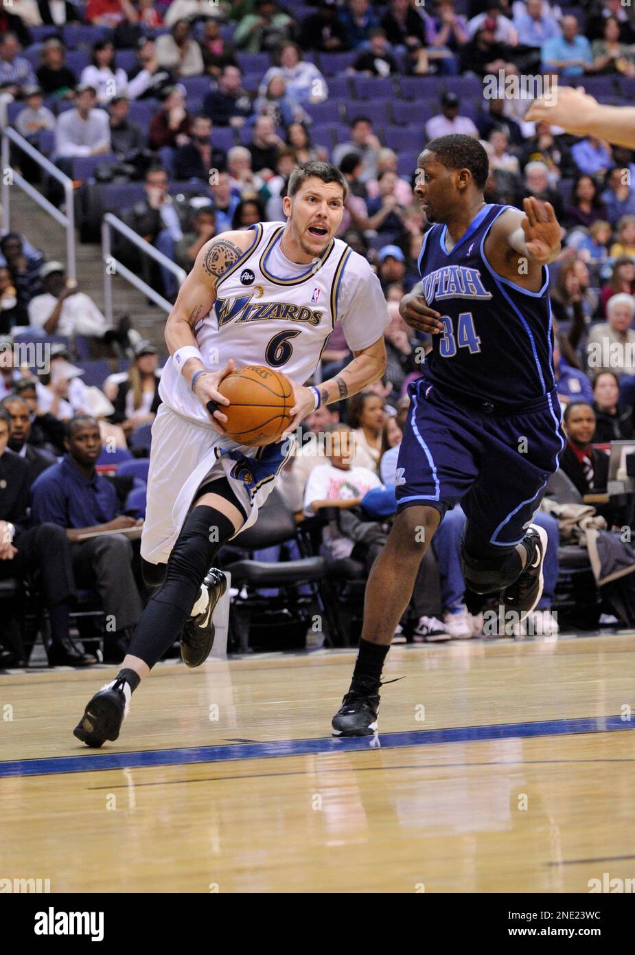 Washington Wizards guard Mike Miller (6) dribbles against Utah Jazz forward C.J. Miles (34 ...