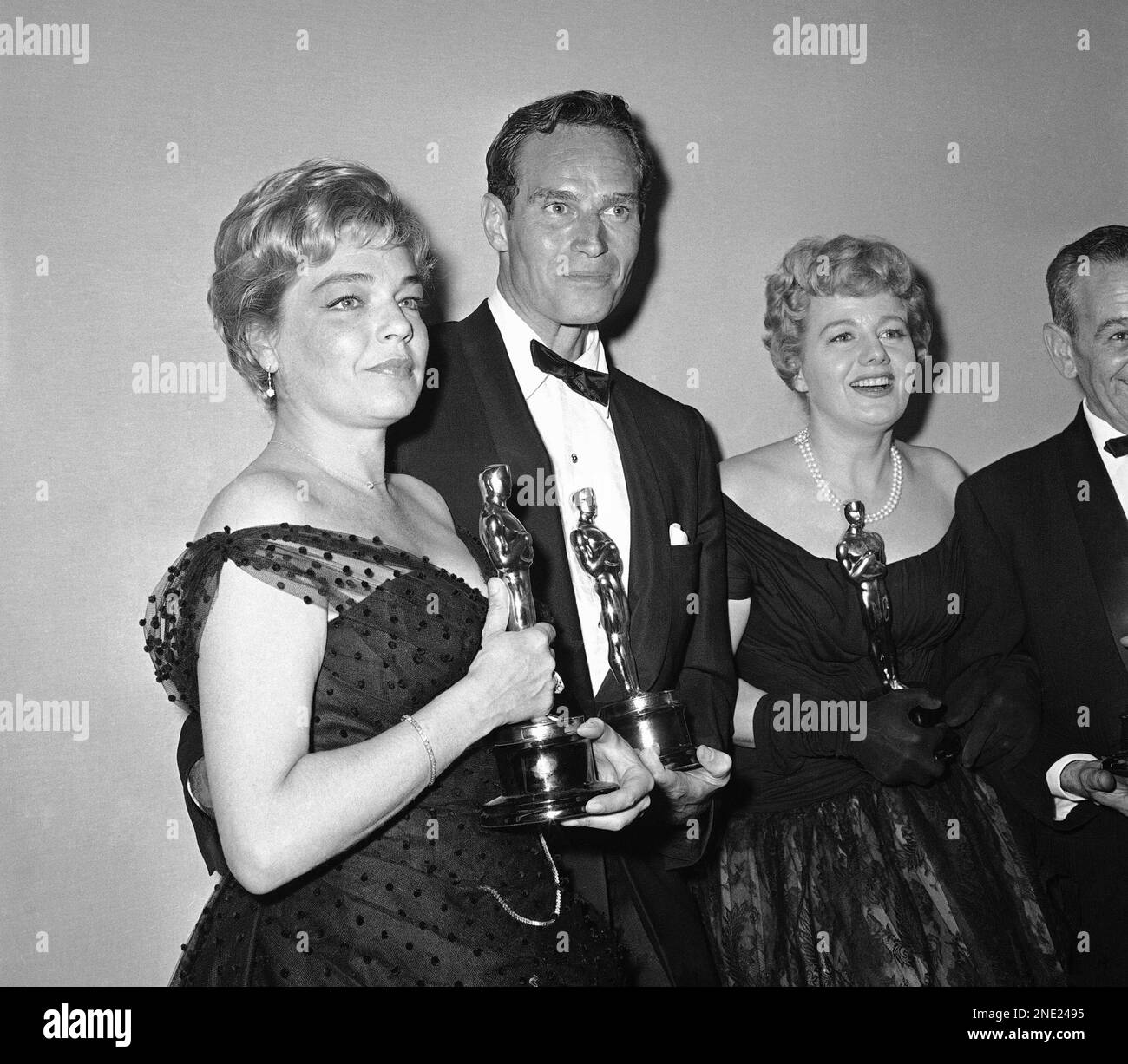 Simone Signoret, left, of France, Charlton Heston and Shelley Winters ...