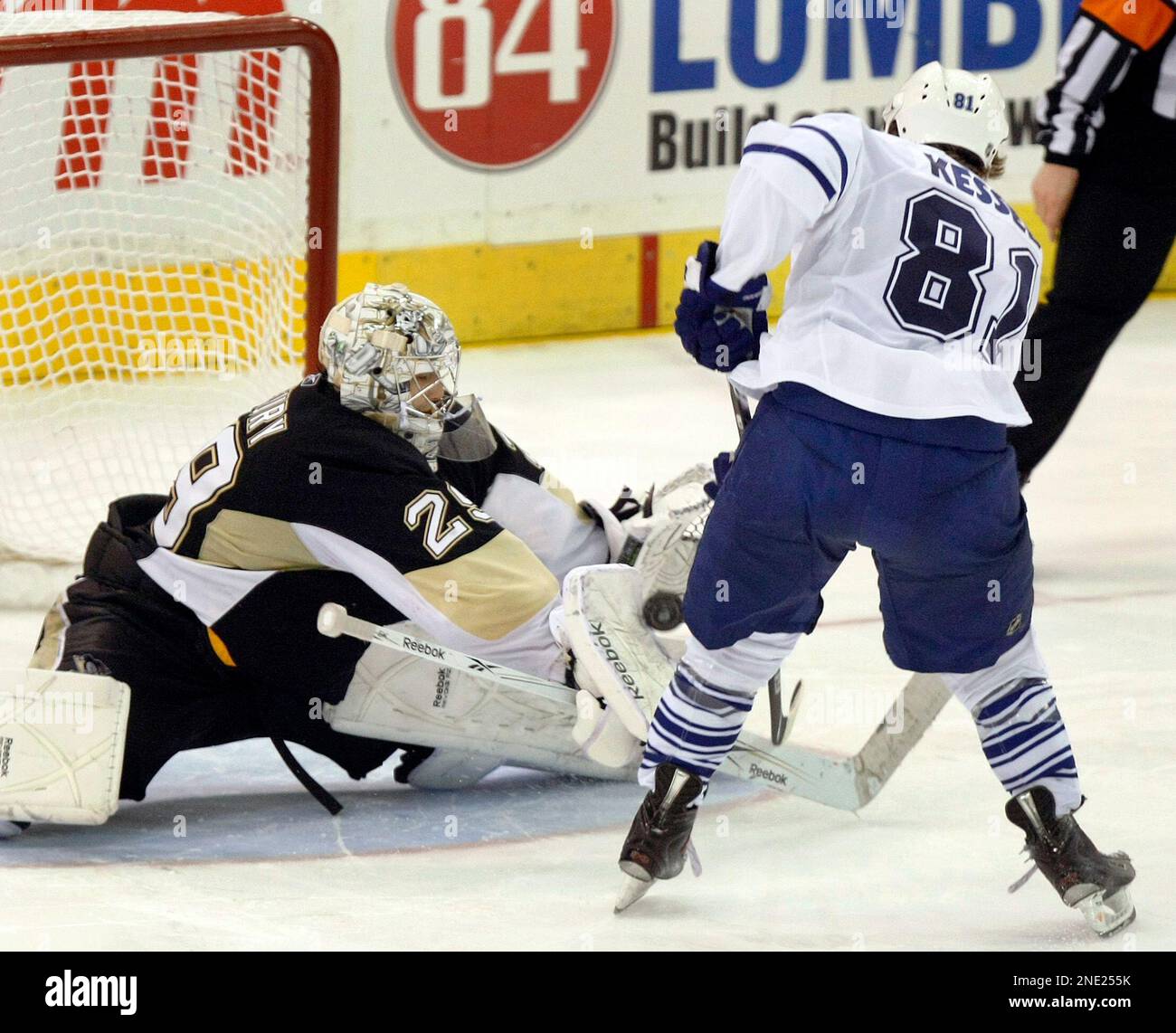 Pittsburgh Penguins goalie Marc-Andre Fleury, left, stops Toronto Maple ...