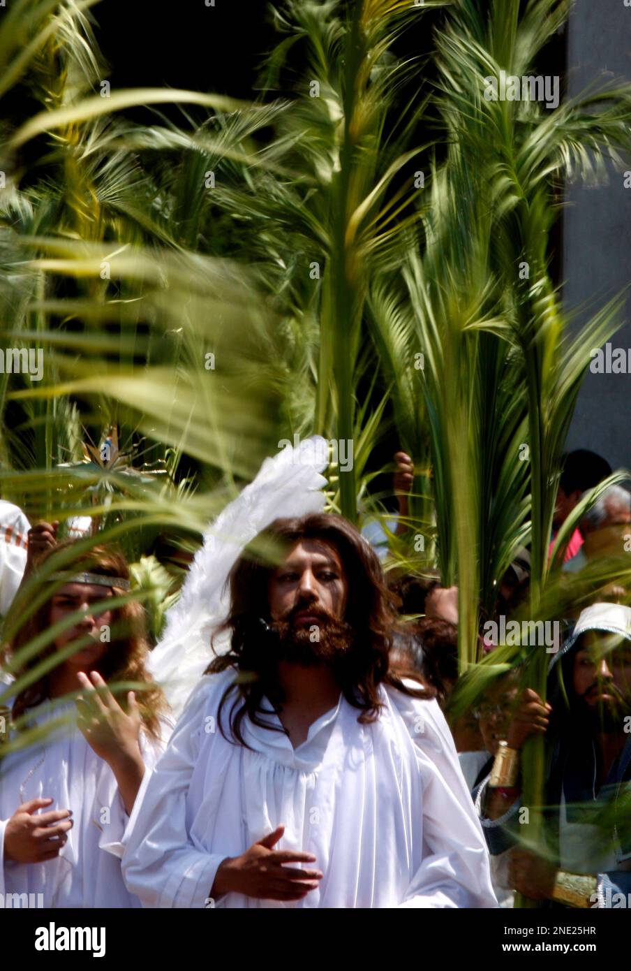 Francisco Serrano portrays Jesus Christ during a Palm Sunday procession ...