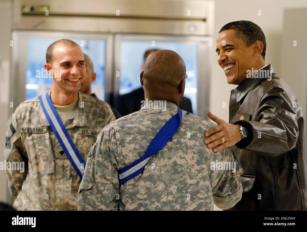 President Barack Obama greets military personnel in Dragon dining ...
