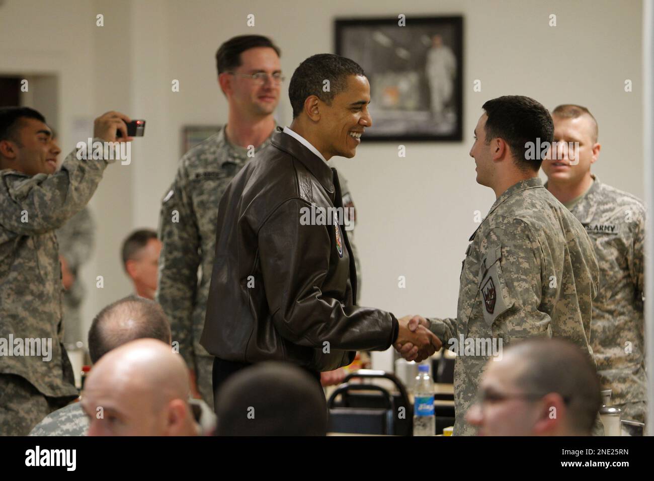 President Barack Obama greets military personnel in Dragon dining ...
