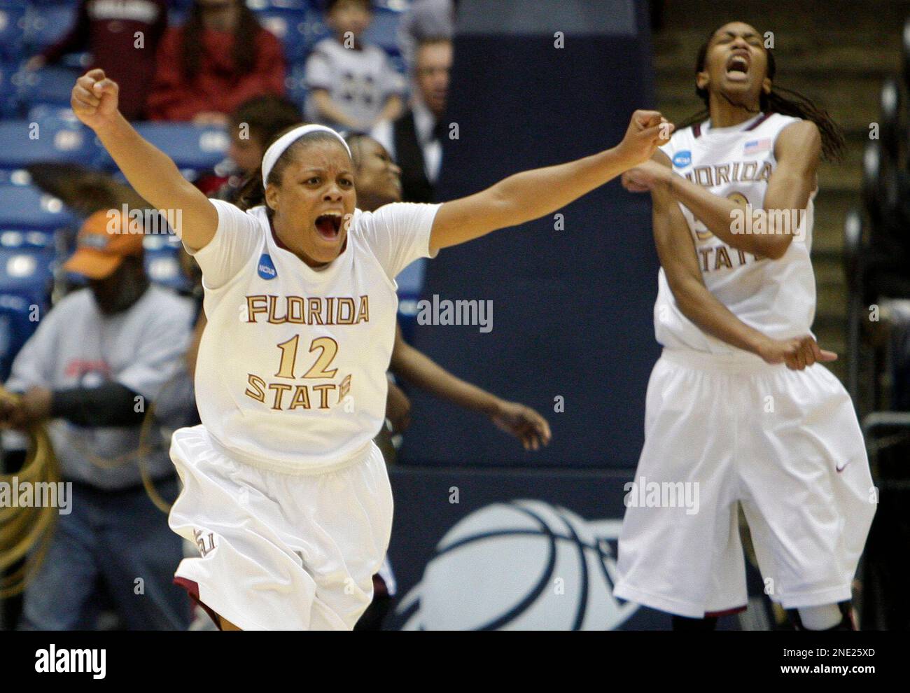 Florida State's Courtney Ward (12) and Jacinta Monroe, right, celebrate ...