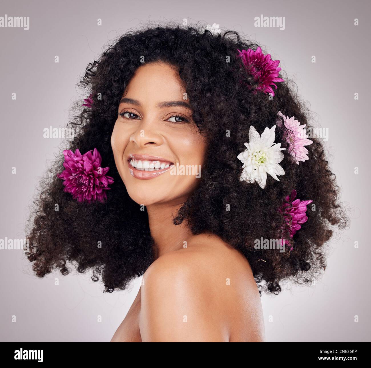 Portrait, black woman and hair care, flowers and shine with smile, girl ...