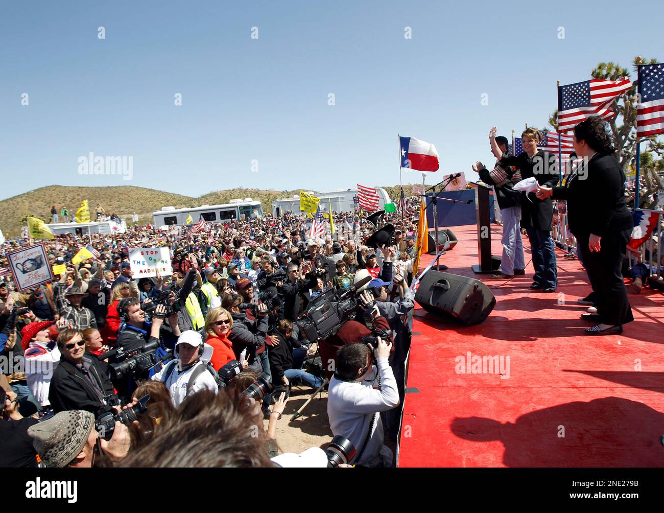 Sarah Palin waves to tea party supporters after speaking at the ...