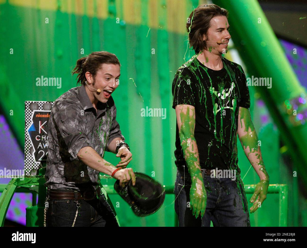 Jackson Rathbone, left, and Jerry Trainor get slimed at Nickelodeon's ...