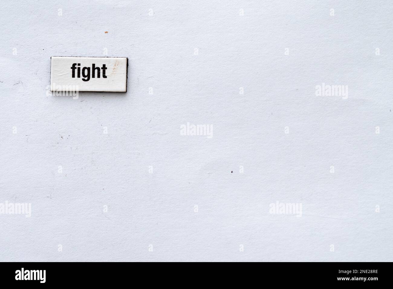 The word fight written on white background Stock Photo - Alamy