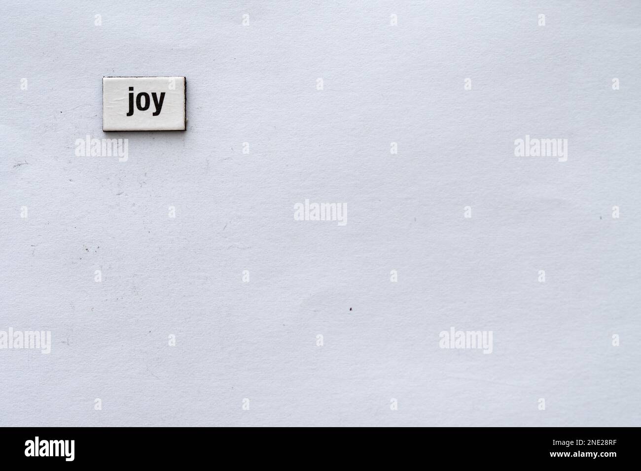 The word "joy" on white background Stock Photo - Alamy