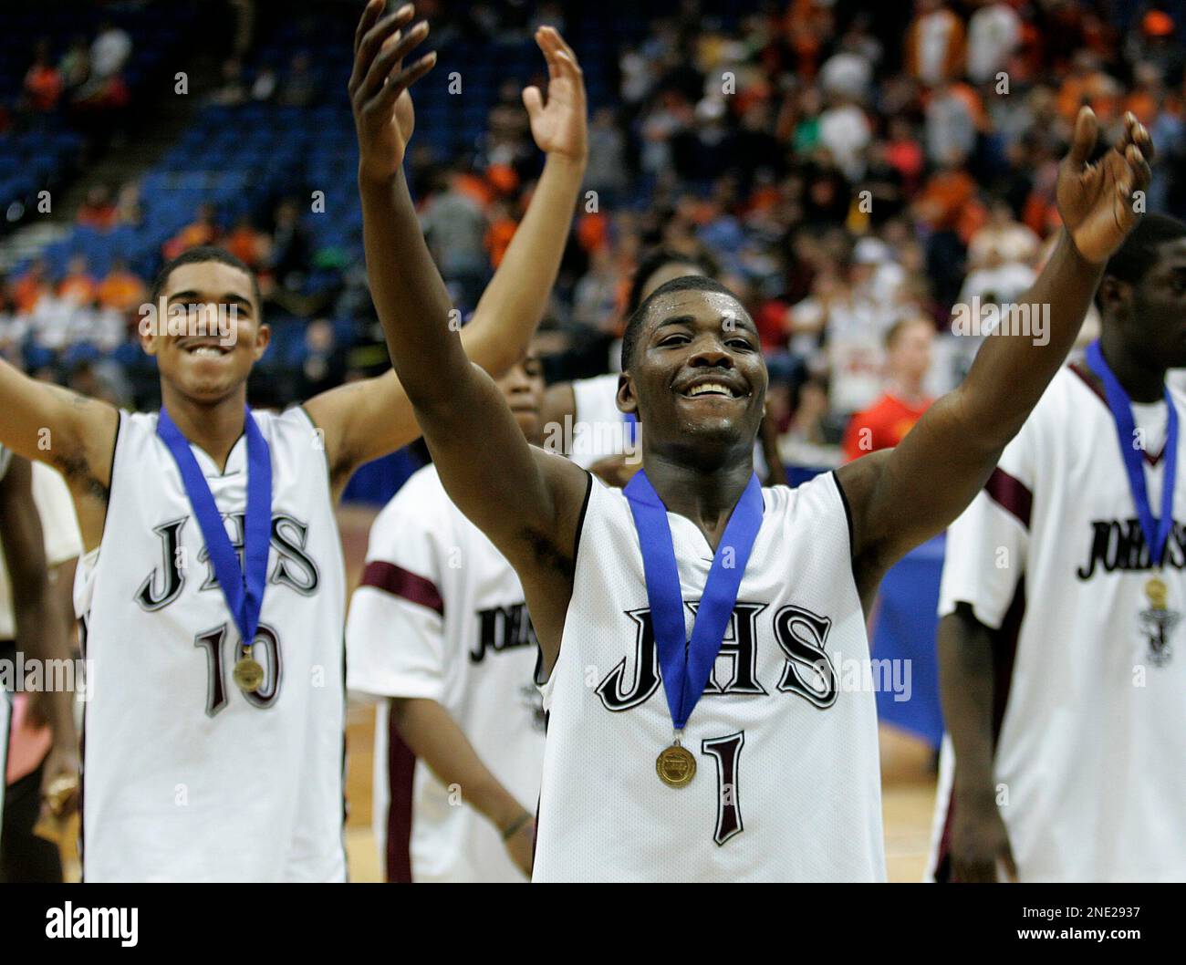 St. Paul Johnson players Anthony Lee (1) and Demitri Conwell (10 ...