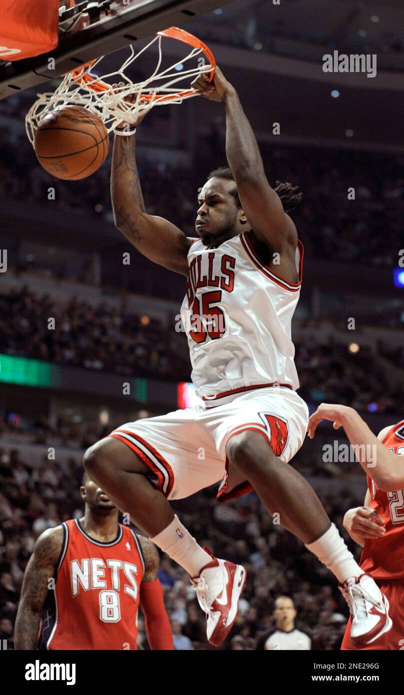 Chicago Bulls' Chris Richard dunks against the New Jersey Nets during ...