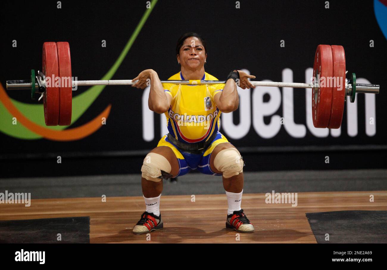 Ecuador's Maria Escobar competes to win the gold in the women's 58 ...