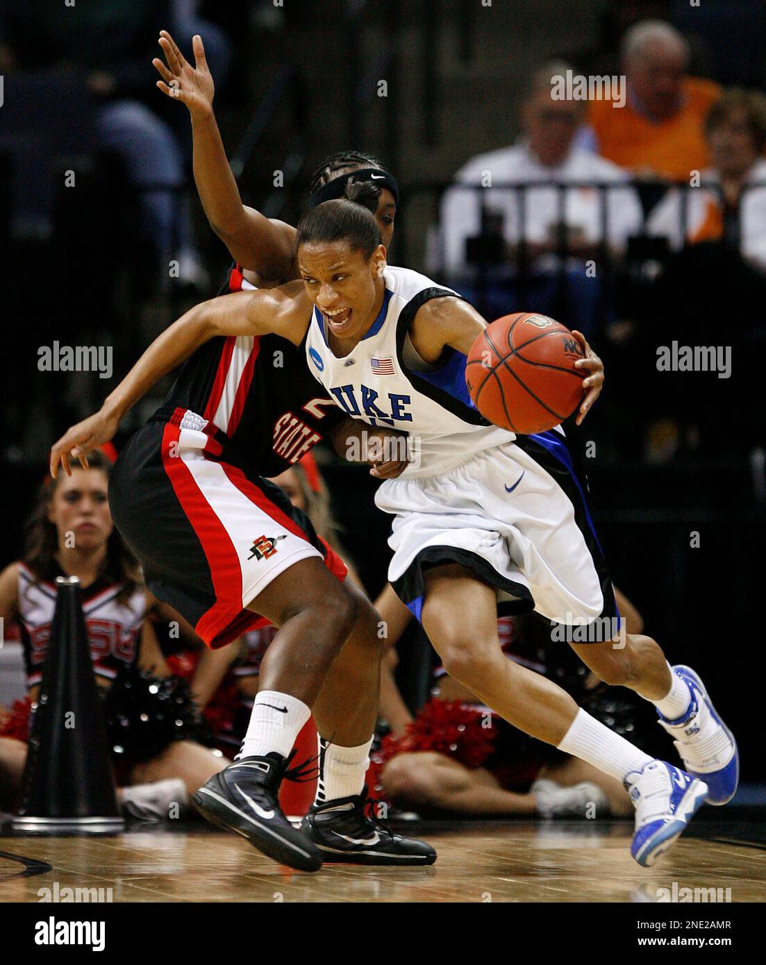 Duke guard Jasmine Thomas, right, drives around San Diego State guard ...