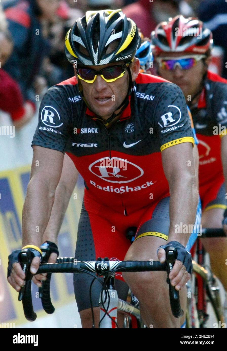 Seven time Tour de France champion Lance Armstrong of the U.S. crosses ...