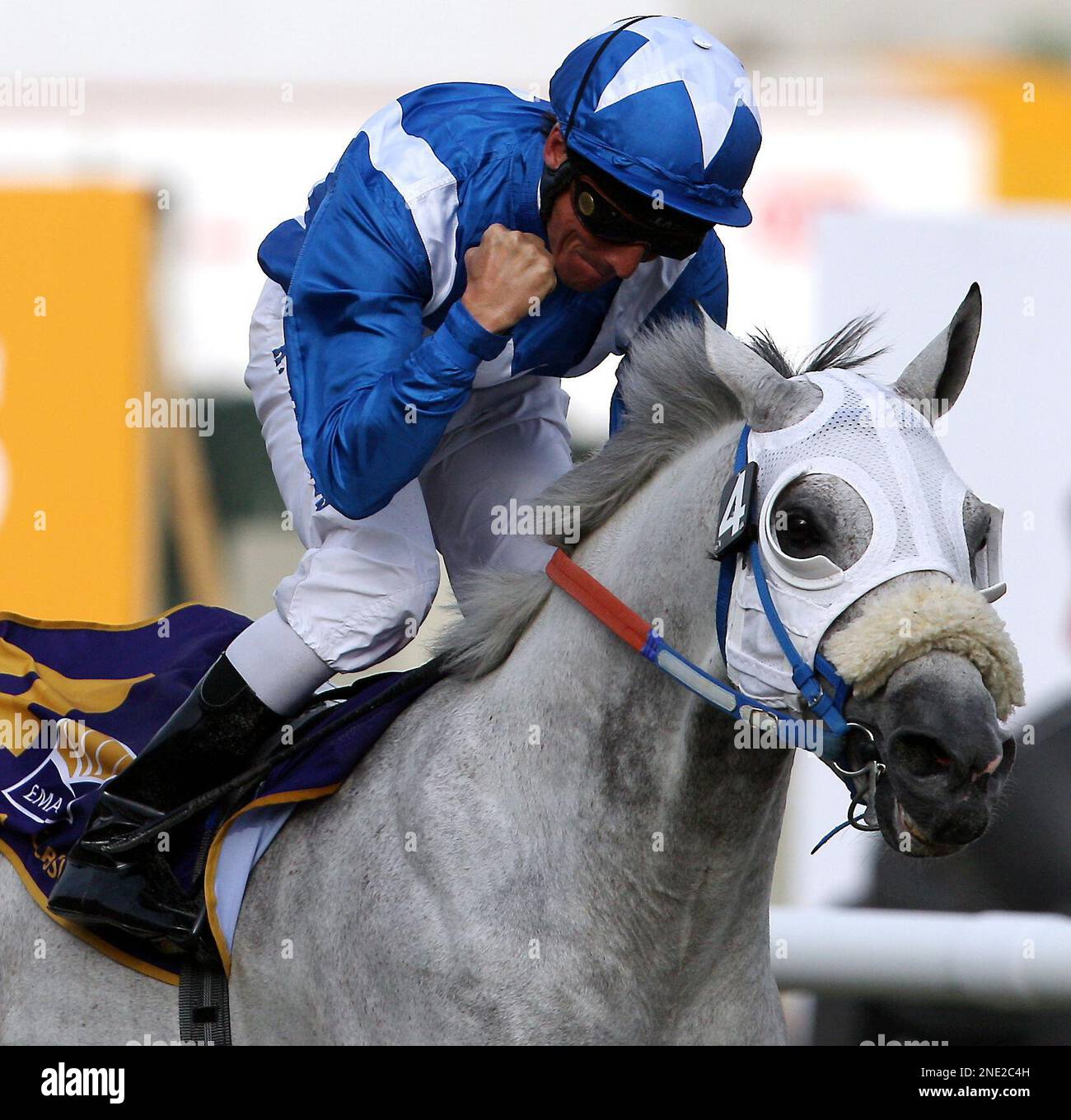 Jaafer ridden by jockey Adrie De Vries crosses the finish line to win ...