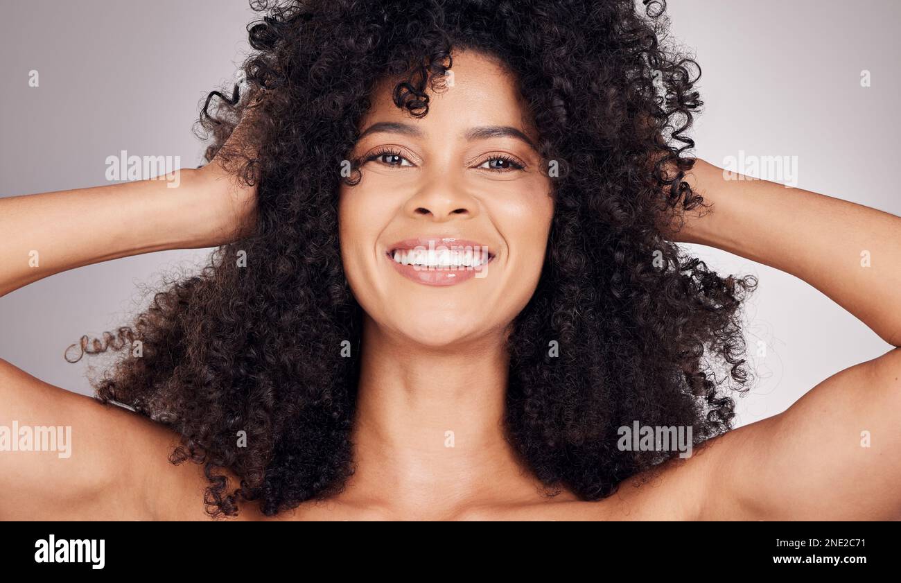 Skincare, happy or portrait of black woman in studio with natural hair ...