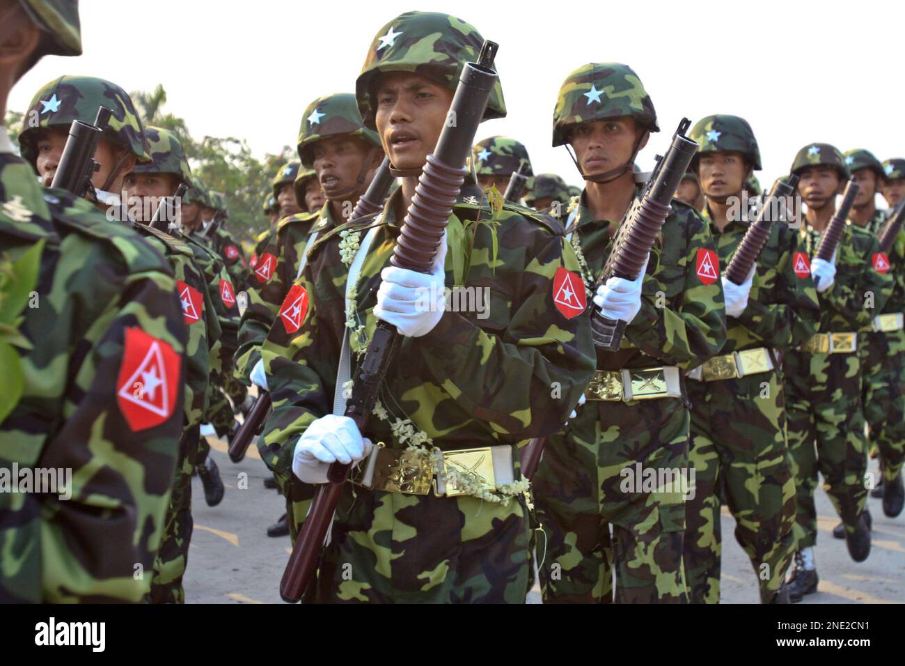 Myanmar soldiers march during ceremonies Saturday, March 27, 2010, at ...