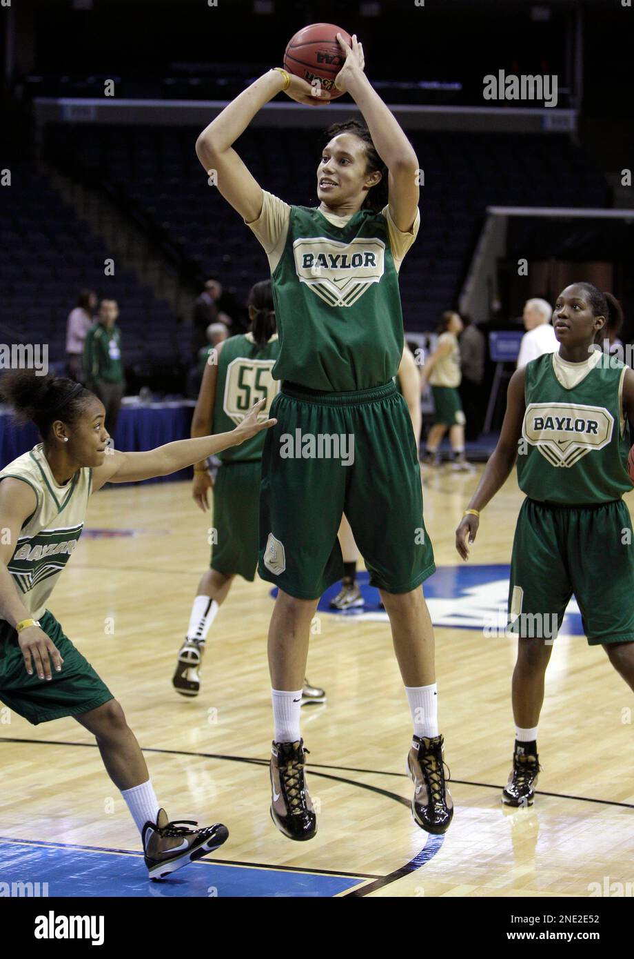Baylor's 6'8" freshman Brittney Griner, center, shoots during NCAA ...