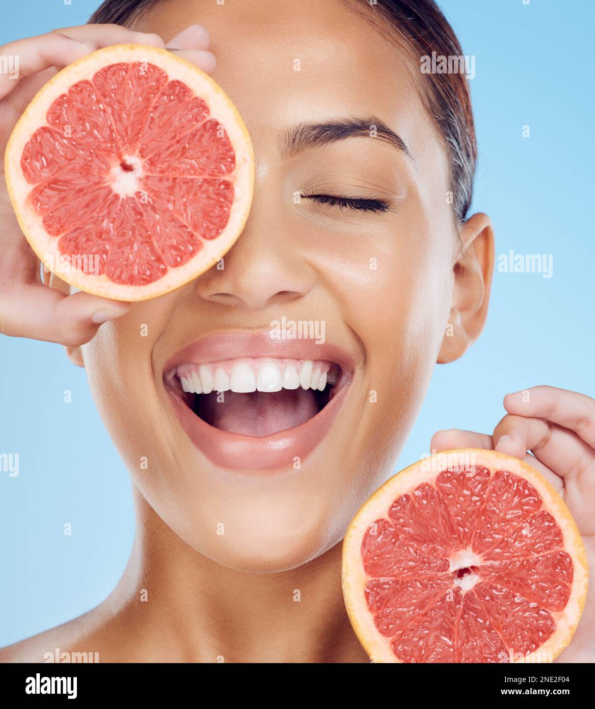 Grapefruit, laughing and woman with face for beauty on studio ...